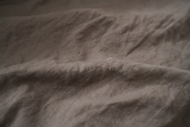 Brown Crumpled Linen Bed Cover with Sunlight from Window Stock Photo ...