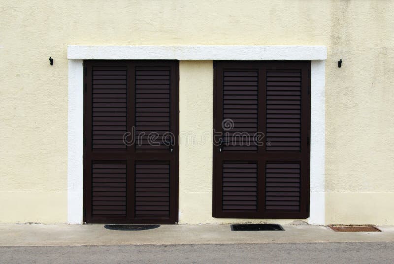 Brown Door with Shutters in Front View Stock Image - Image of exterior ...