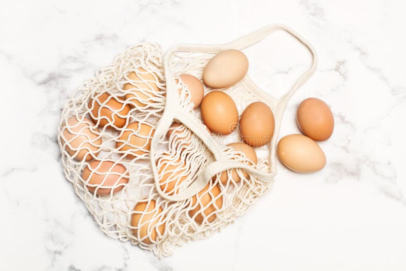 Brown Eggs in a Cotton Mesh Bag on a Marble Kitchen Countertop Stock ...