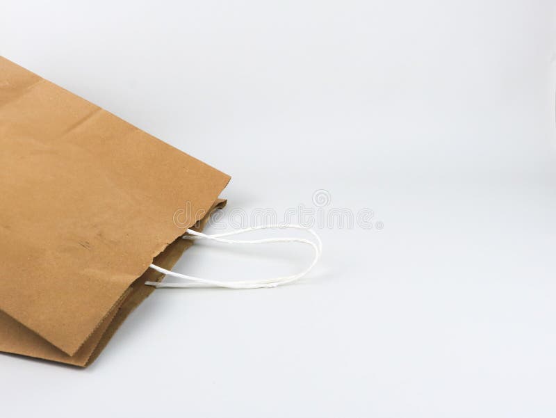 Brown Empty Paper Bag for Stuffs Container in White Isolated Background ...