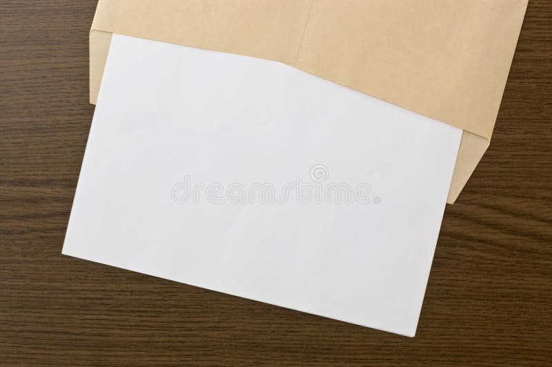 Brown Envelope and Blank Paper Stock Photo - Image of opening, grain ...