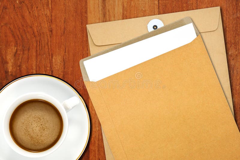 Brown Envelope Document and a White Coffee Cup Stock Image - Image of ...