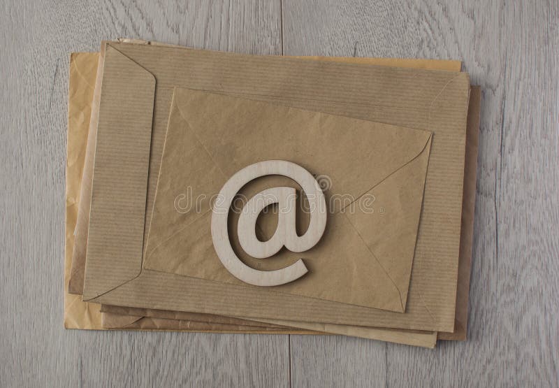 Email Simbol at Sign on Brown Envelopes Background Stock Image - Image ...