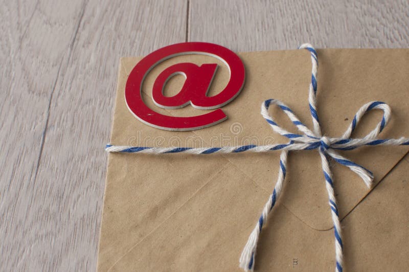 Email Simbol at Sign on Brown Envelopes Background Stock Image - Image ...