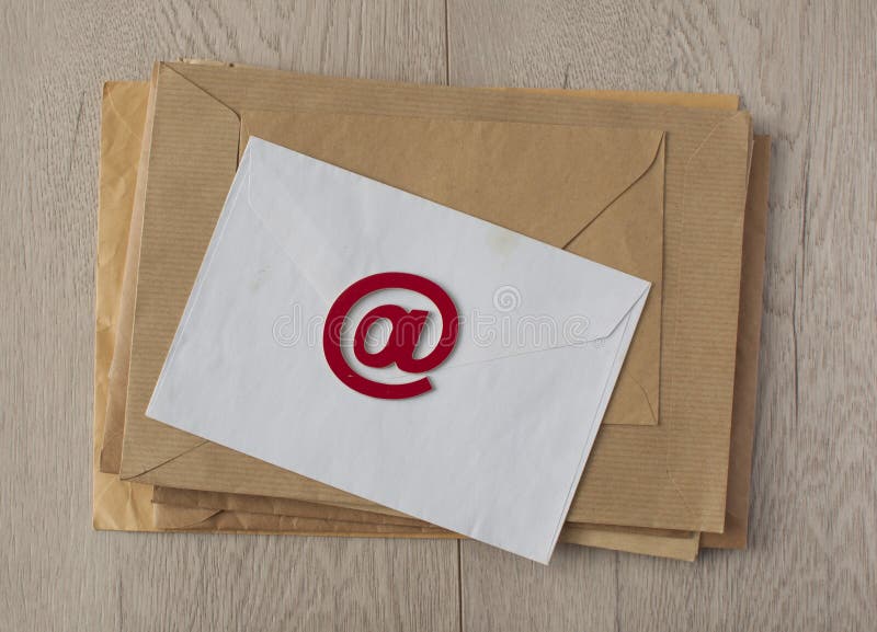 Email Simbol at Sign on Brown Envelopes Background Stock Image - Image ...