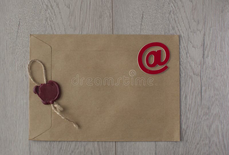 Email Simbol at Sign on Brown Envelopes Background Stock Image - Image ...
