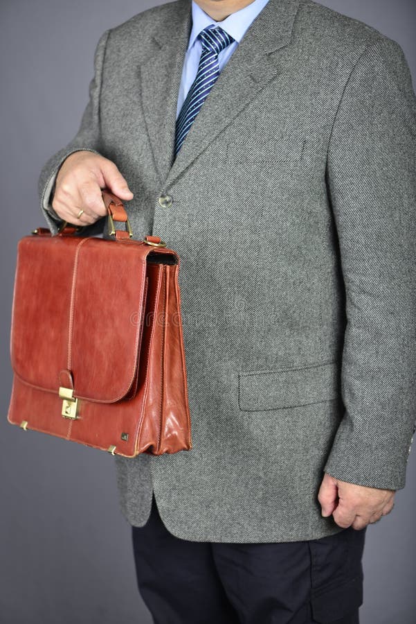 Brown fashion suitcase. stock image. Image of businessperson - 87555381