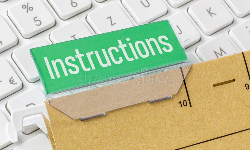 A Brown File Folder Labeled Instructions Stock Image - Image of ...