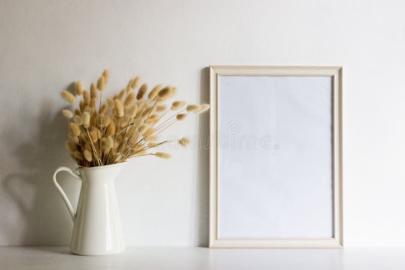 Brown Flowers with White Frame Over the Table with Natural Light. Stock ...