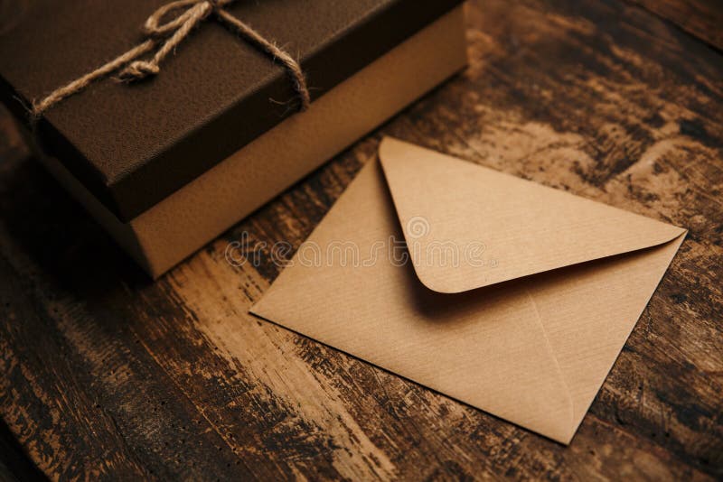 Brown Gift Box and Vintage Envelope on Wooden Textured Rustic ...