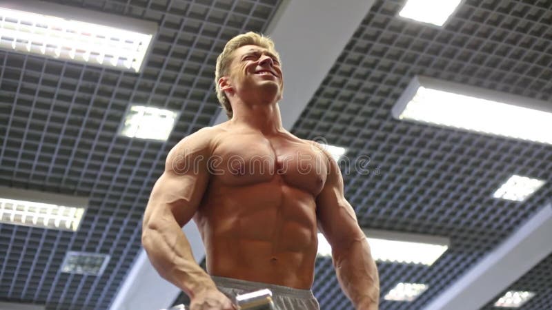 Brown Hair Bodybuilder is Doing Exercise with Stock Footage - Video of ...