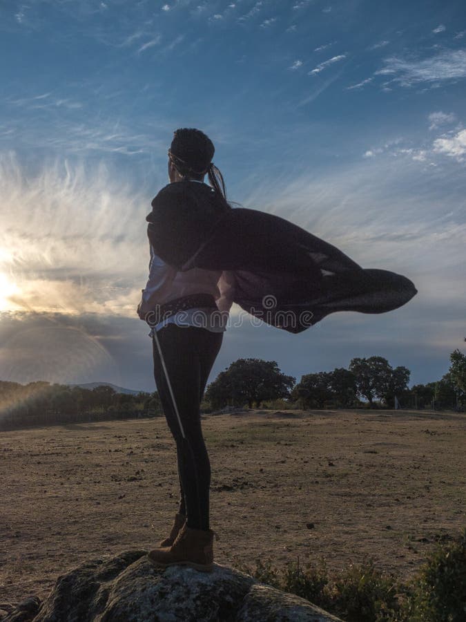 Brown-haired Man with Elf Ears, Tiara on Head and Black Cape, Looks ...