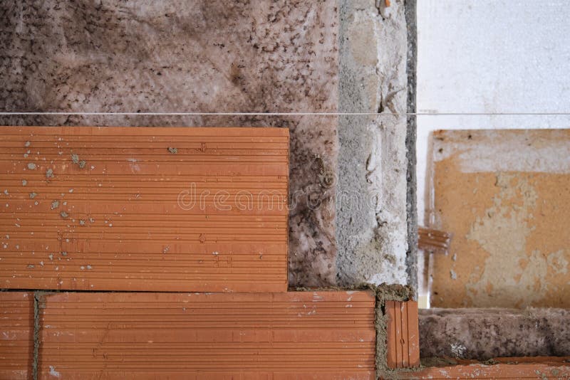 Brown Insulation Rock Wool Blanket Placing between the Wall and the ...