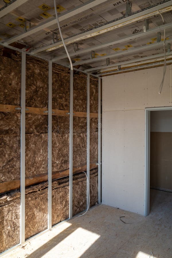 Brown Insulation Rock Wool Blanket Placing between the Wall and the ...