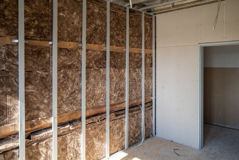 Brown Insulation Wool Was Installed Behind a Drywall Stock Photo ...