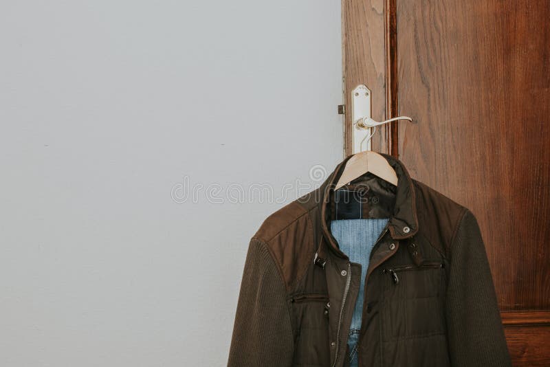 Brown jacket hanging stock photo. Image of sport, casual - 135721168