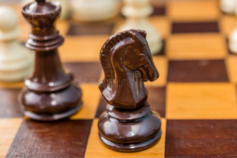 Brown Knight Chess Piece on the Board Background Stock Photo - Image of ...