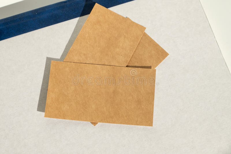 Brown Kraft Paper Cards on White Background with Blue Accent Stock ...