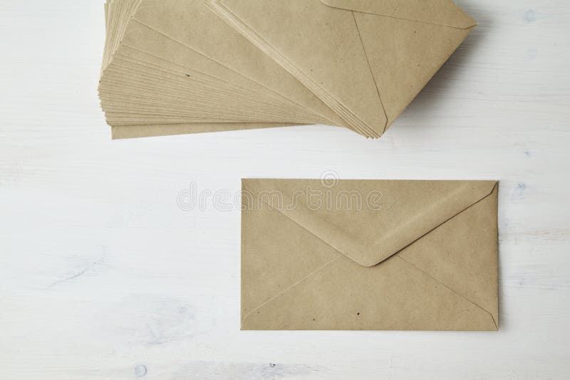 Brown Kraft Paper Post Envelope on Wooden Table Stock Photo - Image of ...