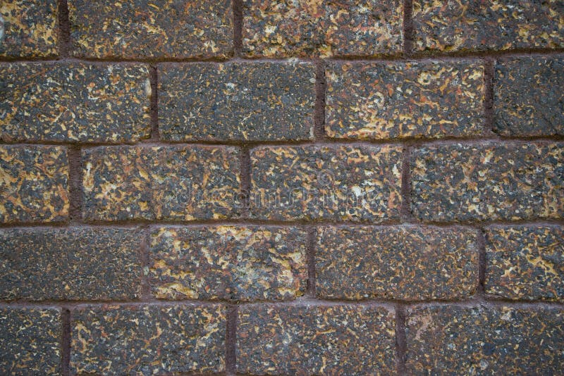 Brown laterite brick wall stock image. Image of rock - 29765665