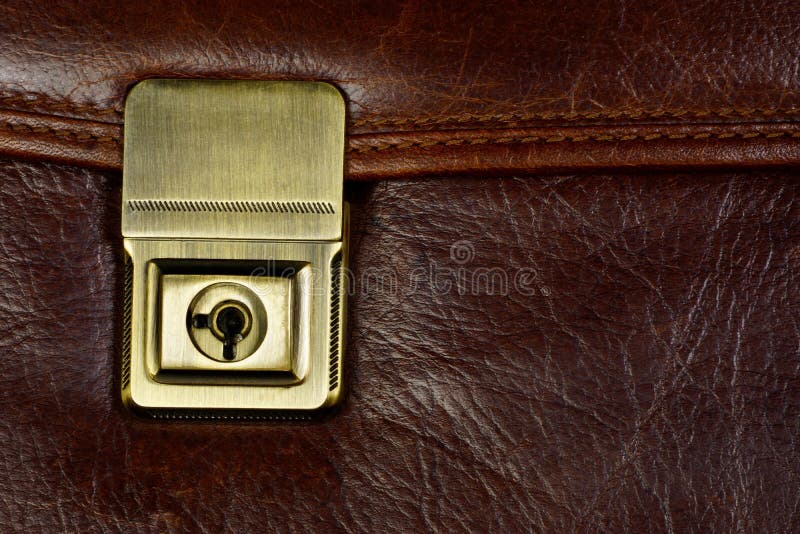 Brown Leather Briefcase and Clasp Lock. Briefcase is a Rectangular Bag ...