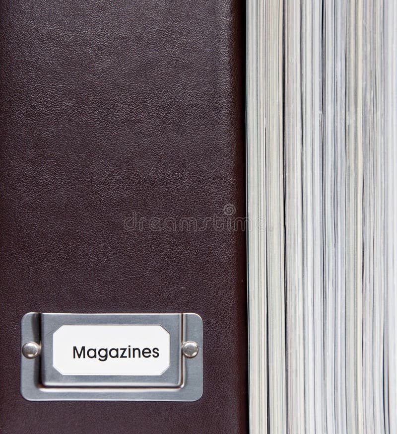 Brown Leather Magazine Holder and Magazines. Stock Photo - Image of ...