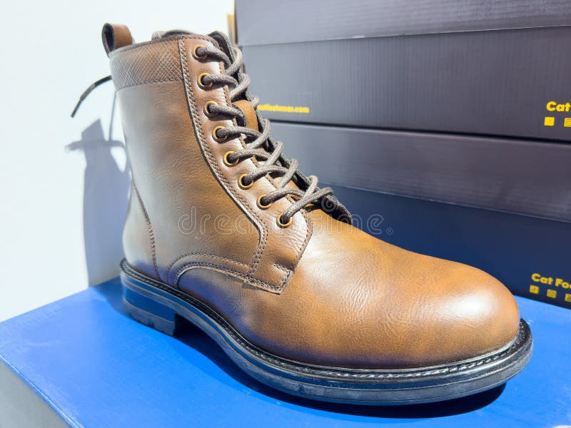 Brown Leather Men S Boot on Display Shelf Editorial Image - Image of ...