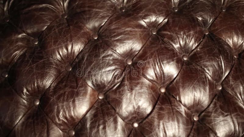 Brown Leather Sofa with Rivets and Folds Close Stock Video - Video of ...