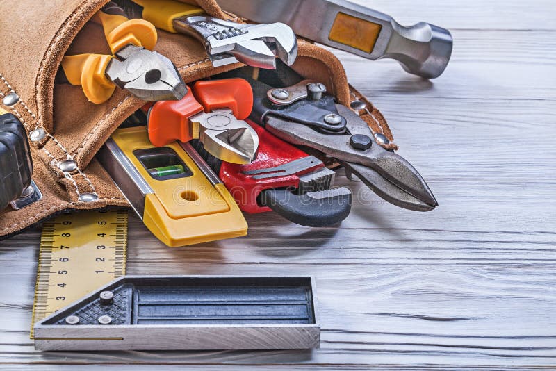 Brown Leather Tool Belt with Construction Tooling on Wooden Boar Stock ...