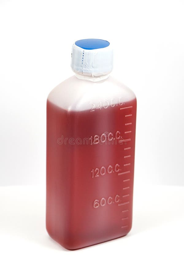 Bottle with brown mixture stock photo. Image of medicine - 13351668
