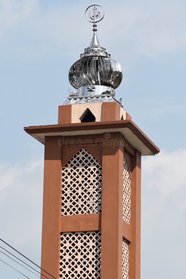 A Brown Mosque Tower with Chrome Top Stock Photo - Image of metal ...