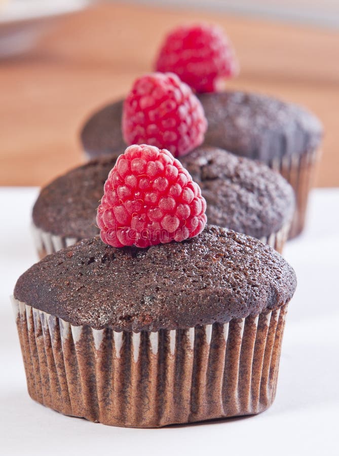 Brown muffins stock image. Image of sweet, raspberries - 16629973