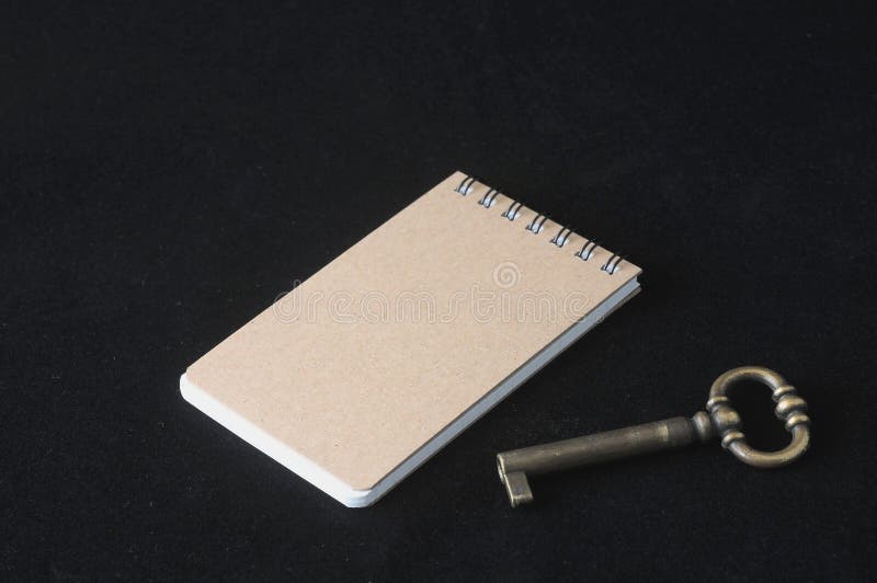 Brown note paper with key stock image. Image of memo - 227534503