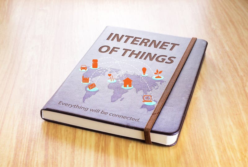 Brown Notebook with Internet of Things Word and Global Map with Stock ...