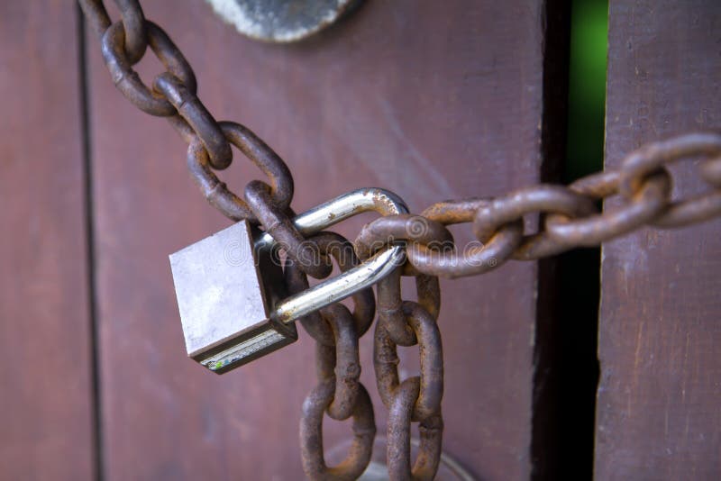 Brown Old Gate Locked by Old Rusty Chain and Locker Stock Photo - Image ...