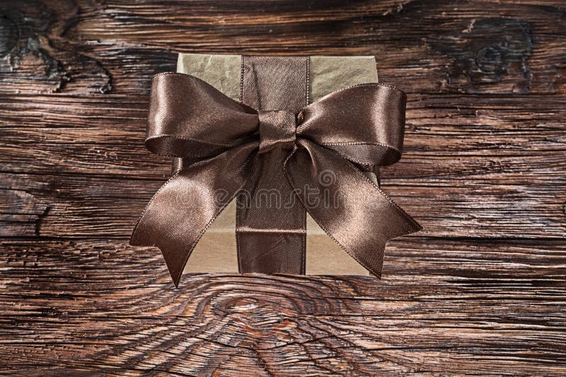 Brown Packed Gift Box on Vintage Board Stock Photo - Image of giving ...