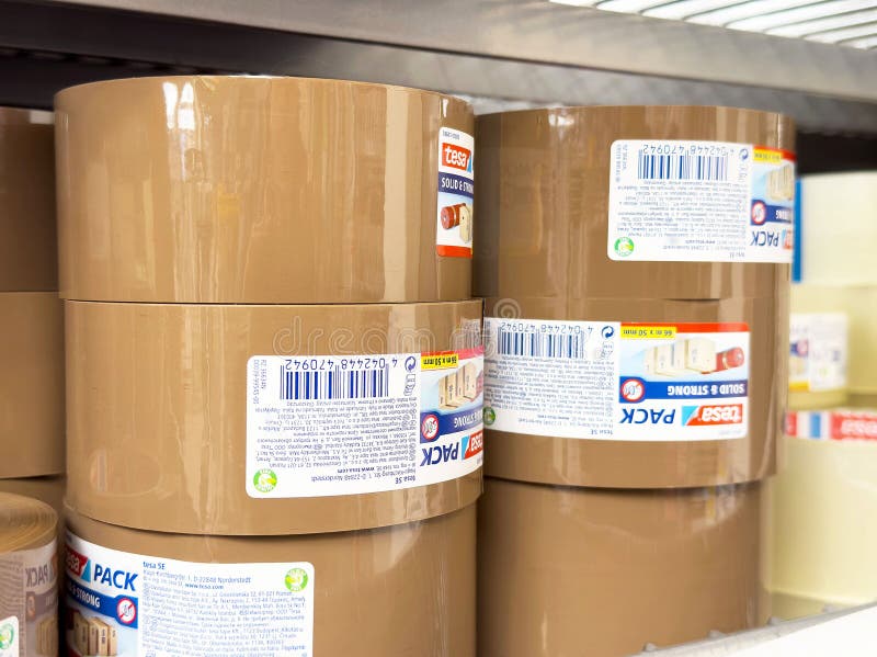Brown Packing Tape Rolls on Store Shelf with Labels and Barcodes ...