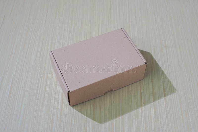 A Brown Paper Box Isolated on a Table, Perfect for Packaging or Gifting ...