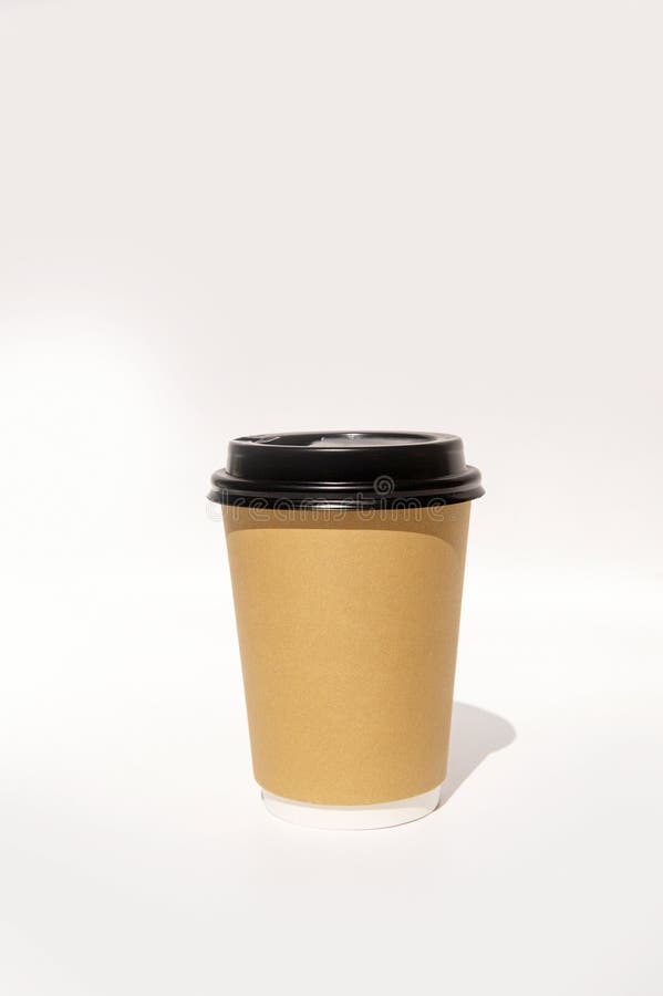 Brown Paper Coffee Cup with Black Lid on Light Background Stock Image ...