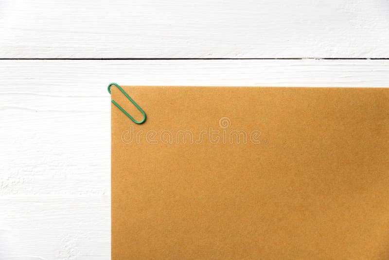 Brown Paper with Green Paper Clip Stock Image - Image of clip ...