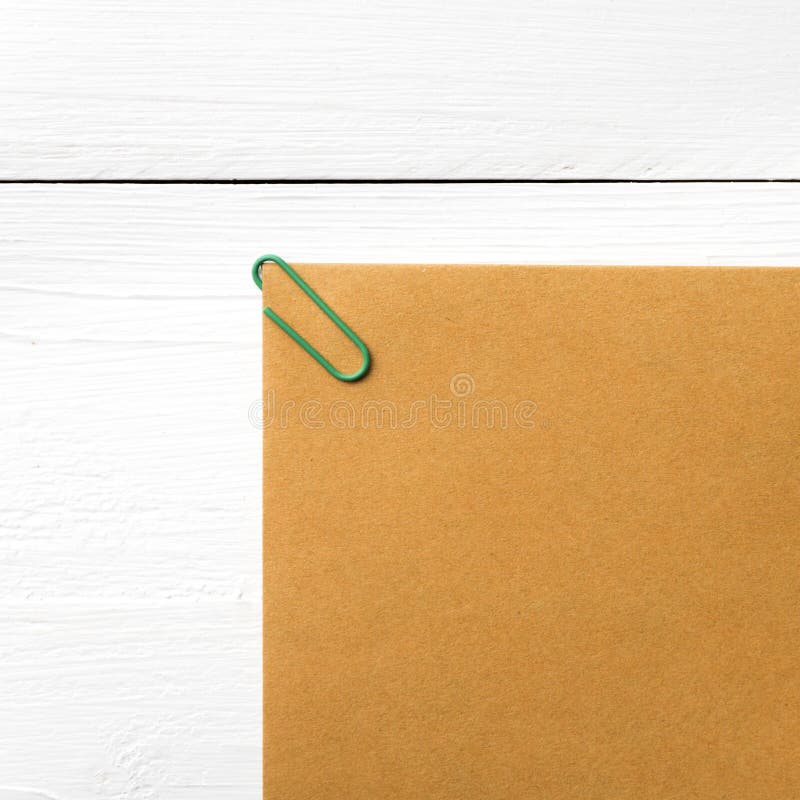 Brown Paper with Green Paper Clip Stock Image - Image of notebook, note ...