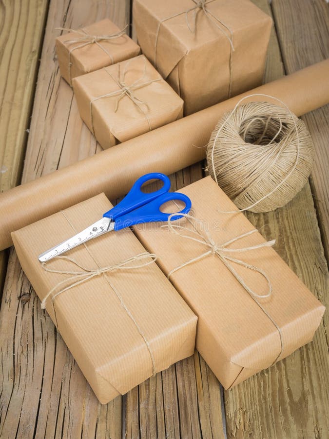 Brown Paper Parcels with Paper String and Scissors Stock Image - Image ...