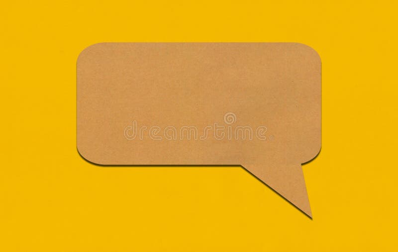 Brown Paper Speech Bubble on Yellow Paper Background Stock Photo ...
