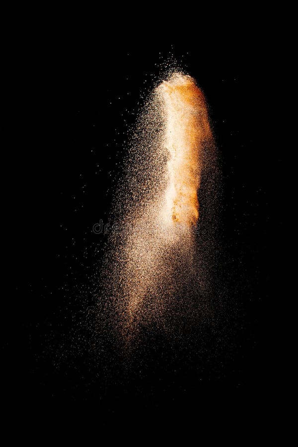 Brown Particles Exploding on Black Background, Brown Dust Splashing ...