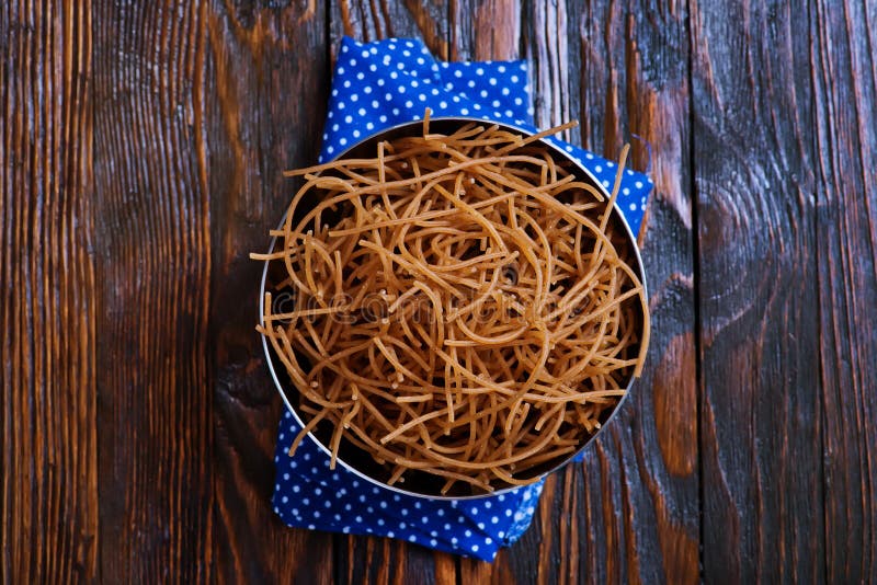 Brown pasta stock photo. Image of diet, eating, long - 76728110