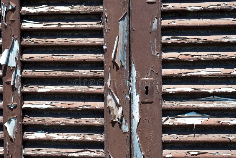 Brown Peeling Shutters stock image. Image of frame, grunge - 44602501