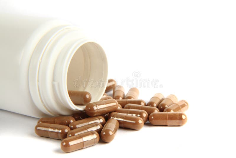 Brown pills stock photo. Image of studio, isolated, group - 44899010