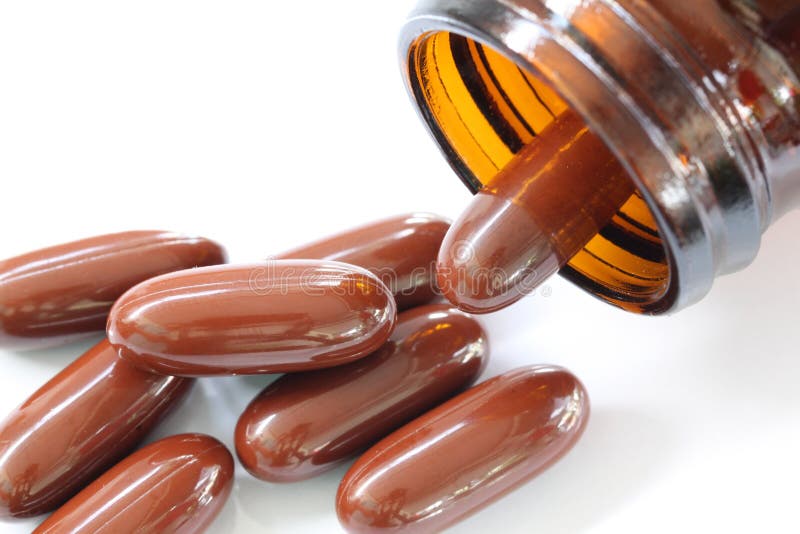 Brown Pill Isolated on White Background. Stock Image - Image of concept ...