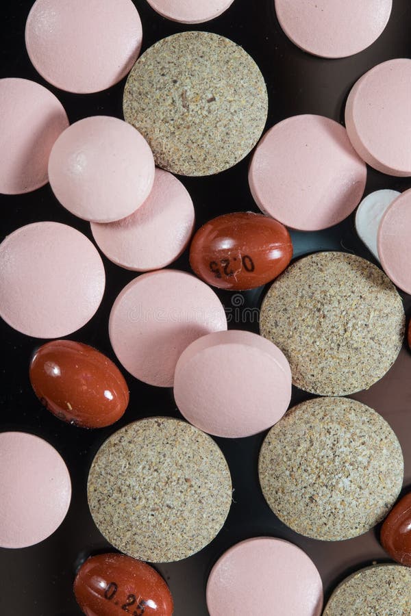 Pink and Brown Painkiller Tablets Stock Image - Image of medical, pink ...