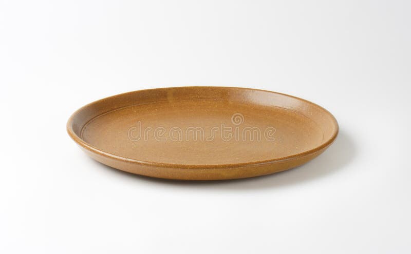 Brown plate stock photo. Image of background, shiny, flatware - 58774392